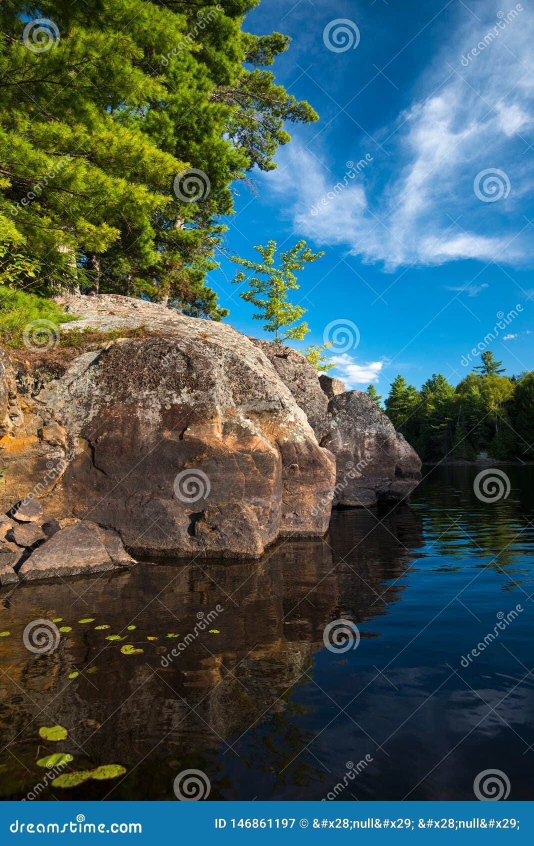 Large Rock Shoreline in Summer Stock Image - Image of forest ...