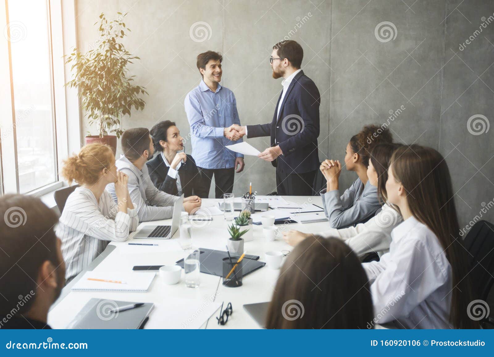 CEO Congratulating Successful Worker by Shaking Hands Stock Photo ...