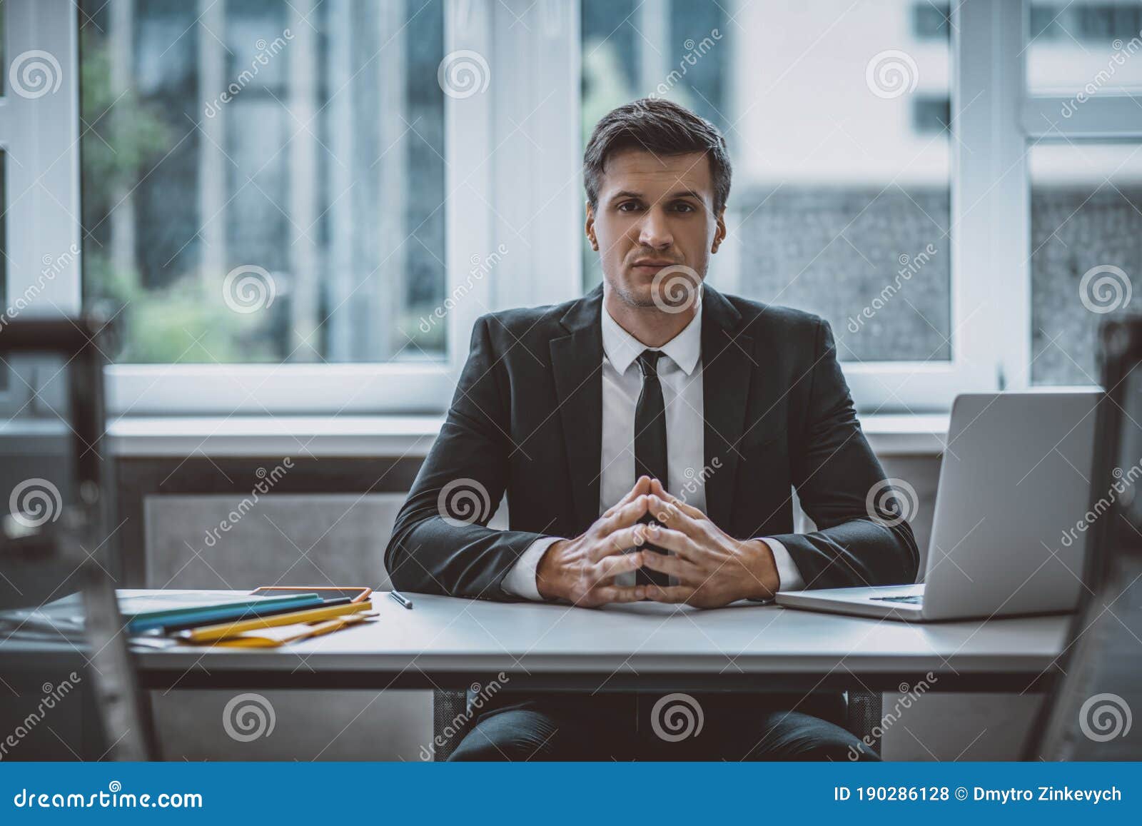 CEO Sitting at His Office while Working Stock Photo - Image of clients ...