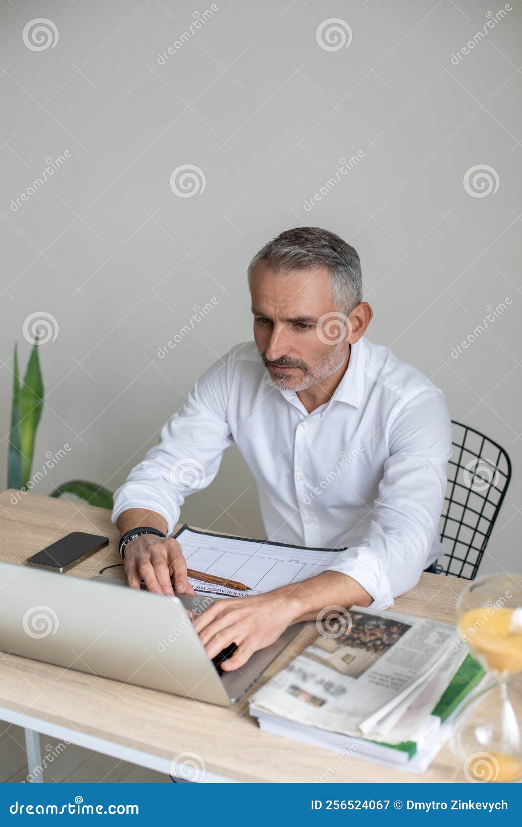 CEO Sitting at His Working Place and Working on the Laptop Stock Image ...