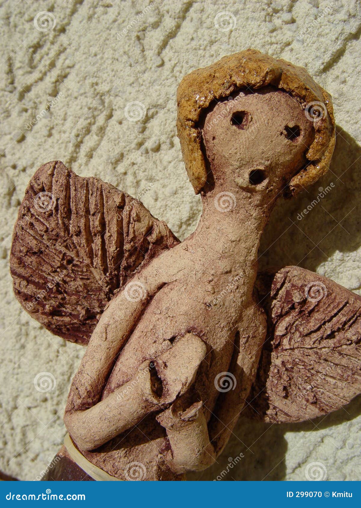 Ceramic angel praying #2 stock photo. Image of earthen - 299070