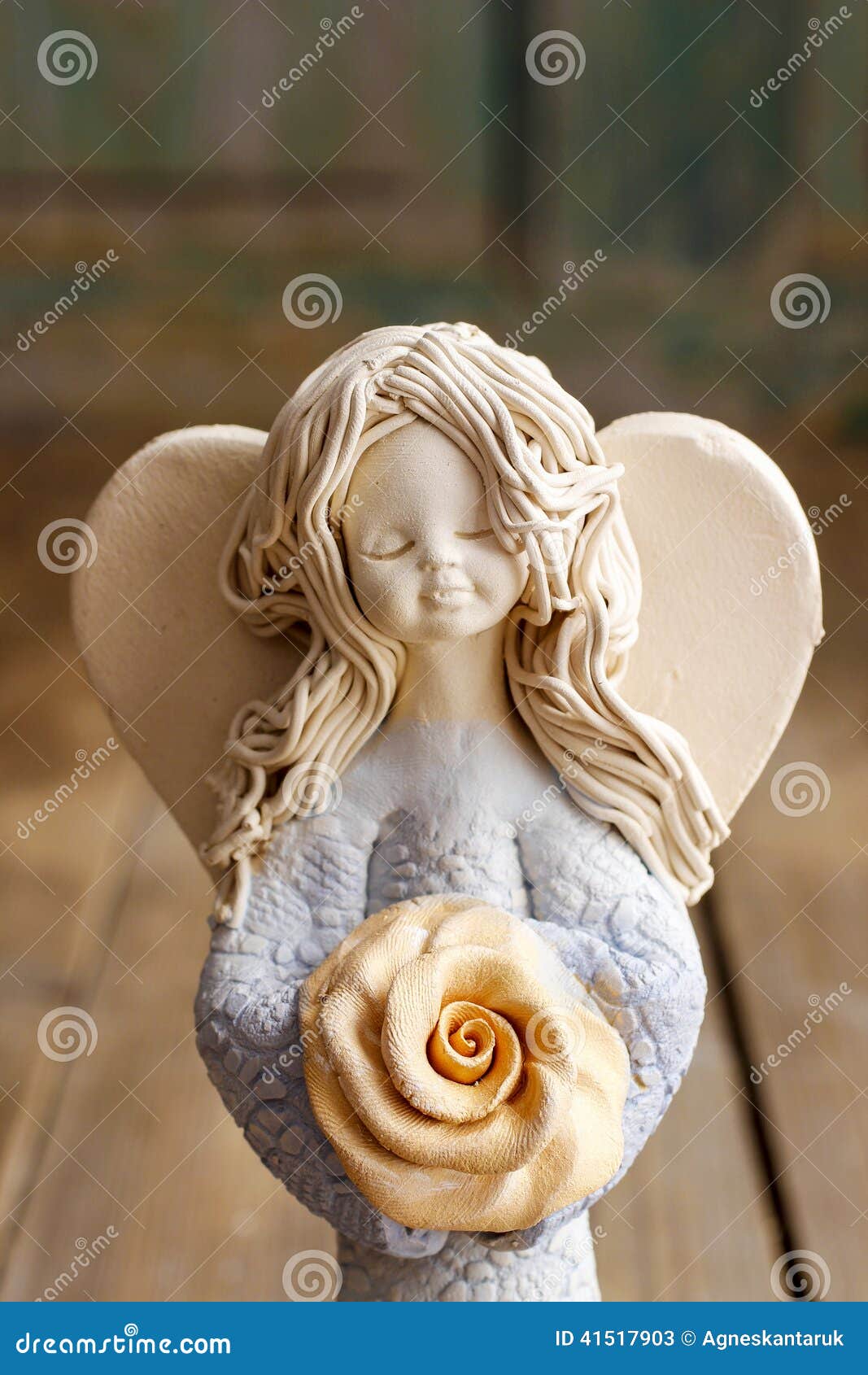 Ceramic Angel on Wooden Table Stock Image - Image of object, decorative ...