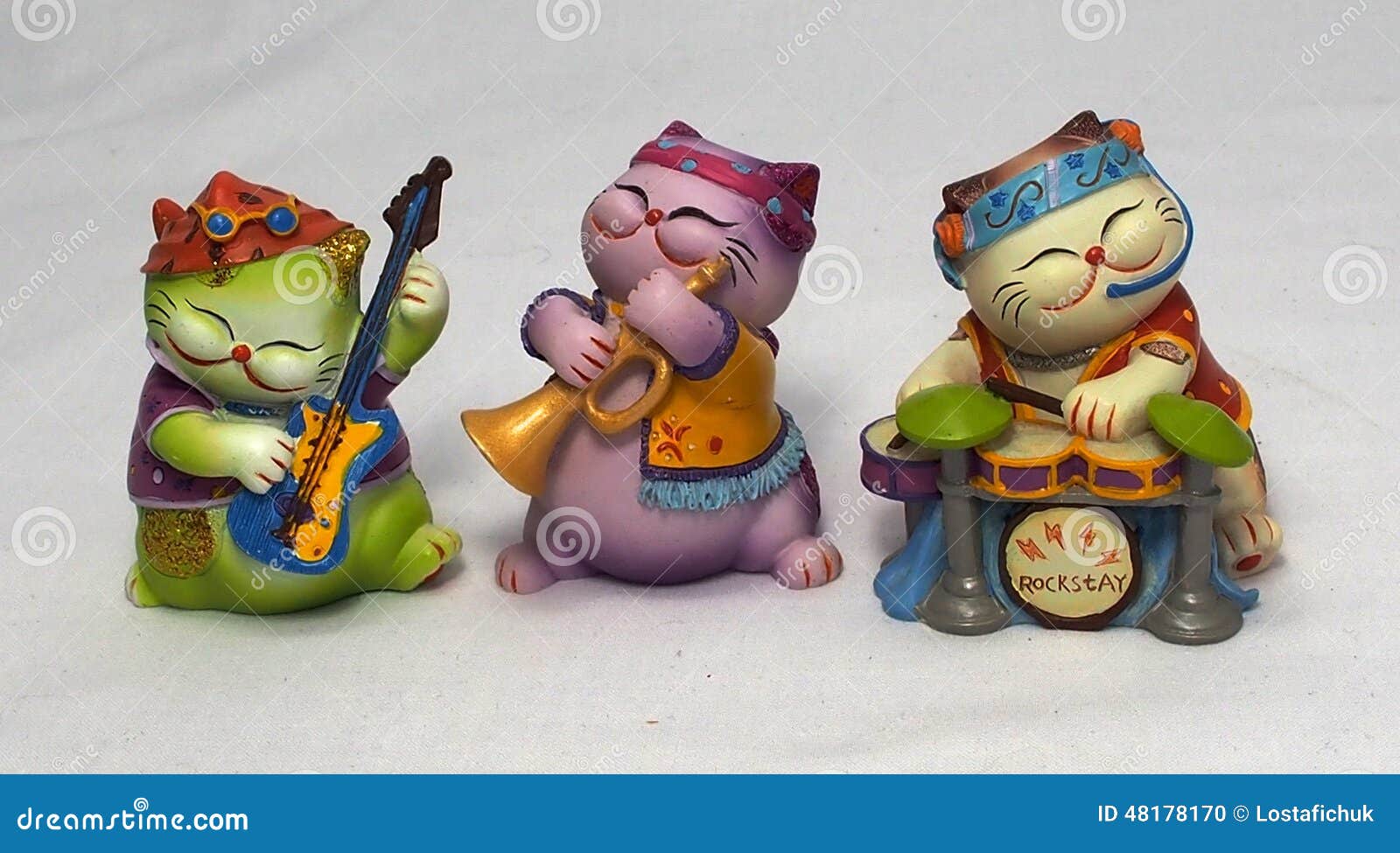 Ceramic Cats Playing Instruments Stock Photo - Image of green, playing ...