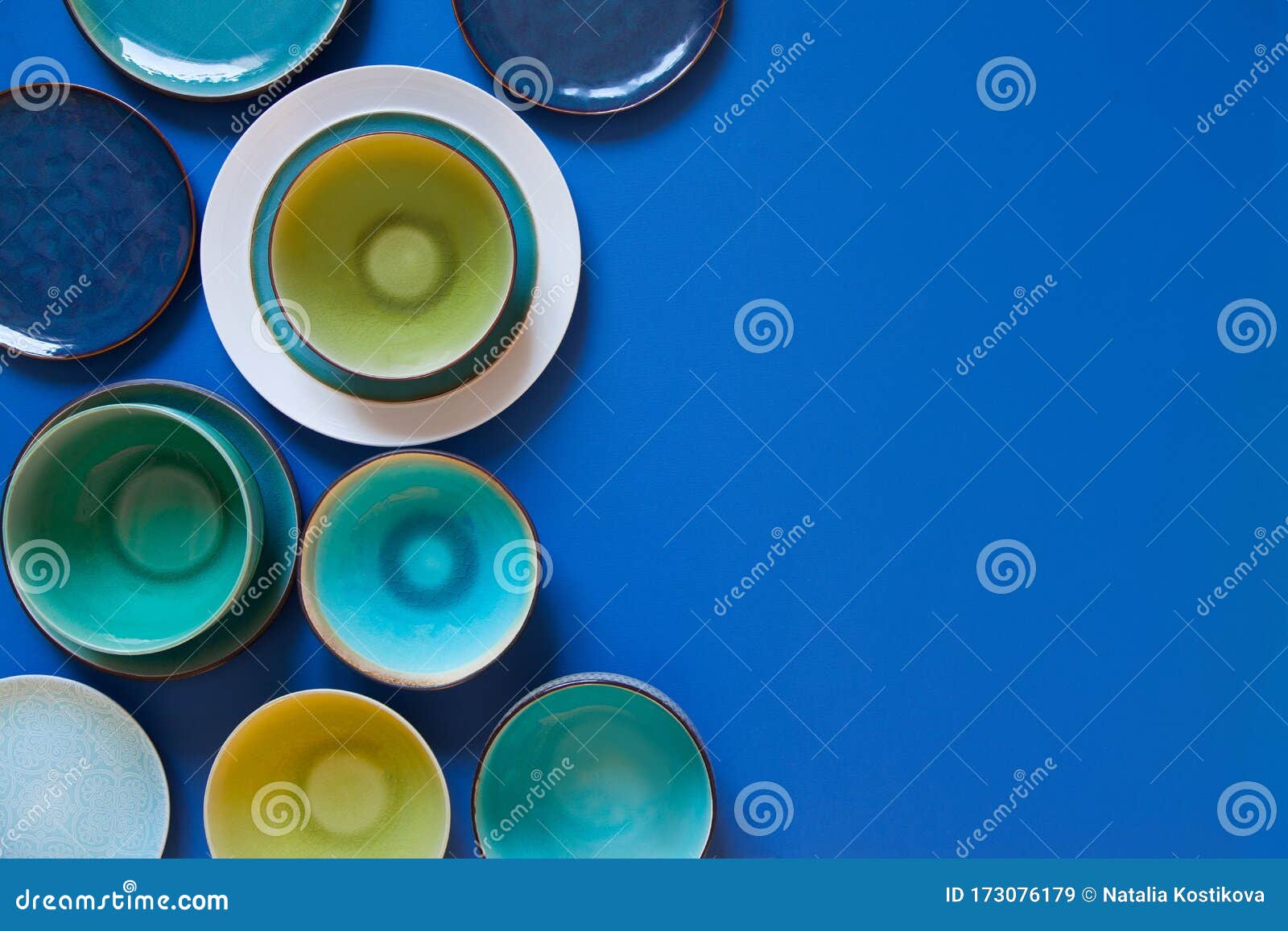 Empty Flat and Deep Plates on a Blue Background Stock Image - Image of ...