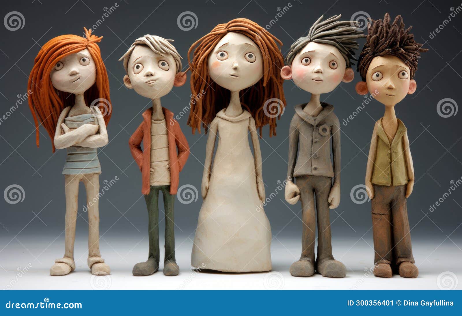 Ceramic Figures of a Group of Children with Different Emotions. Stock ...