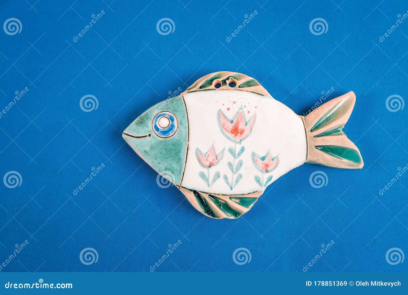 Ceramic Fish Handmade. on a Blue Background. Handwork, Hobbies, Crafts ...