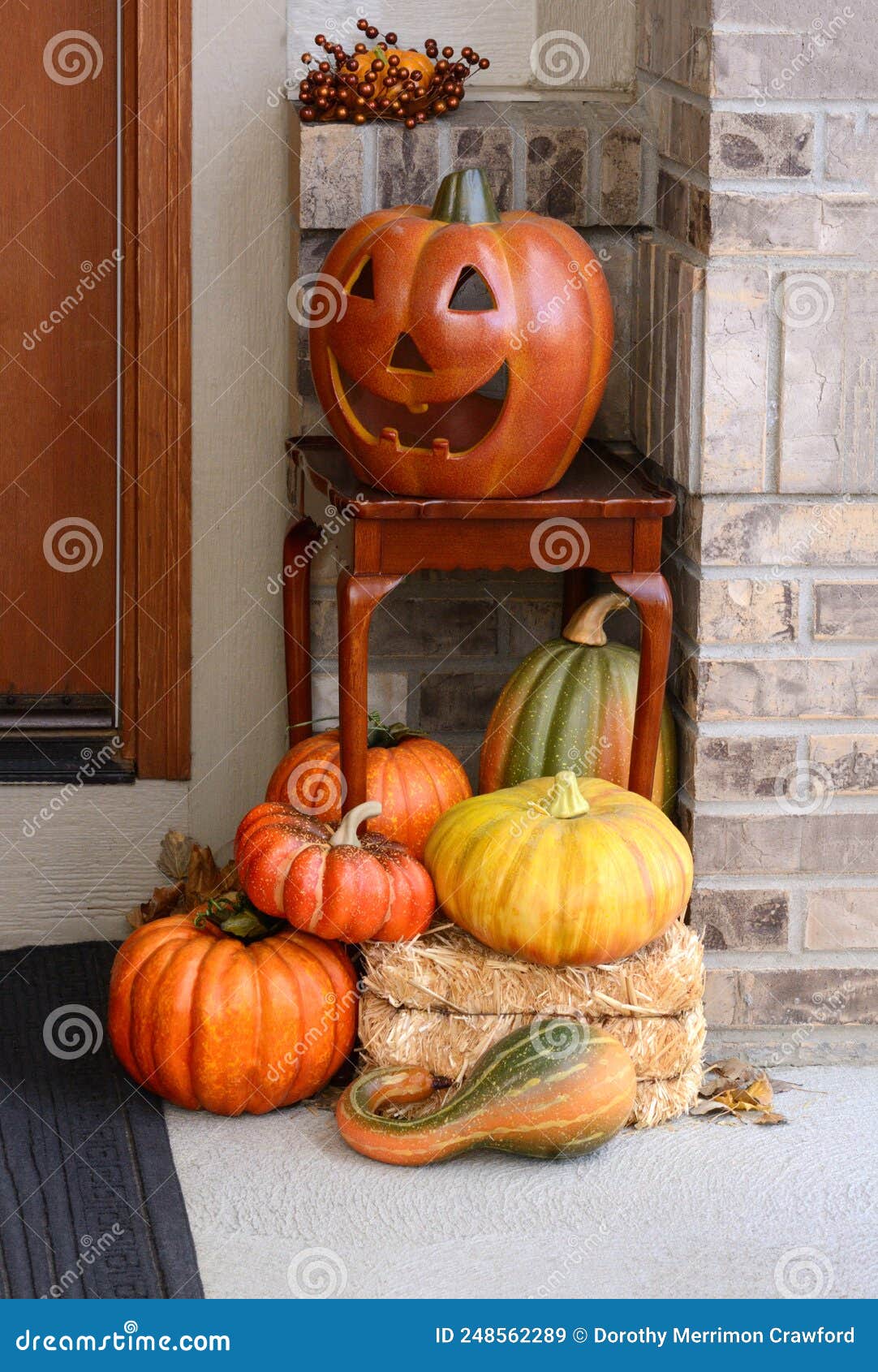 Ceramic Jack O`lantern and Harvest of Pumpkins and Squash Stock Image ...