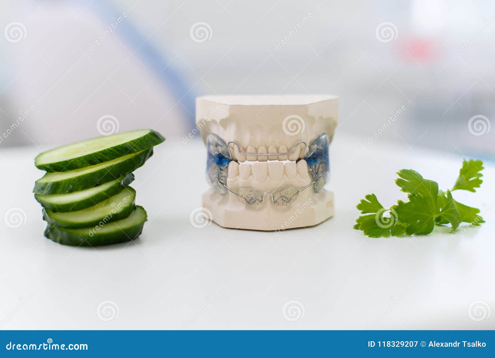 Ceramic Jaws with a Staple Lie with Sliced Cucumber Stock Image - Image ...