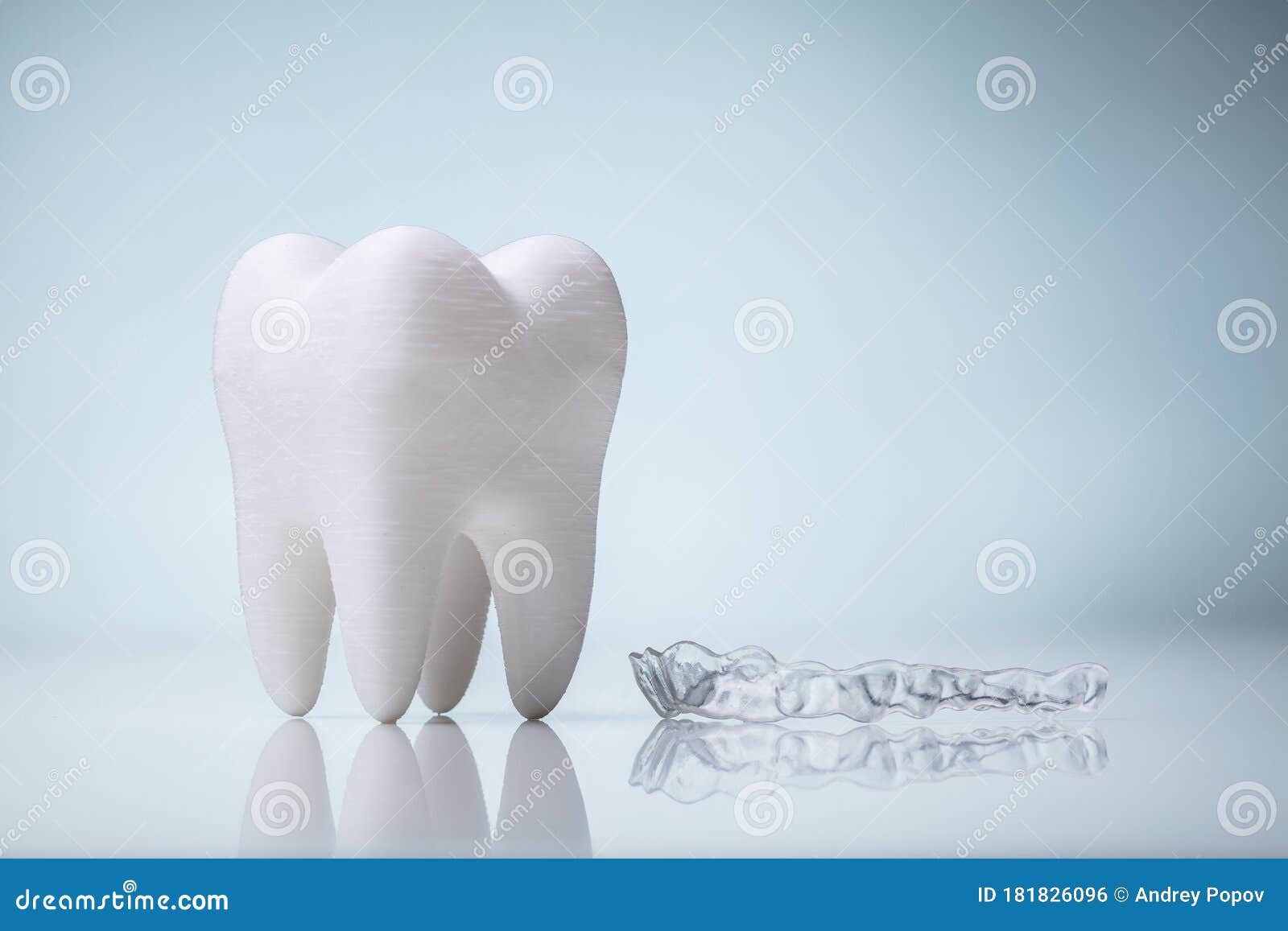 Ceramic Model of Tooth and Mouth Guard on Desk Stock Photo - Image of ...