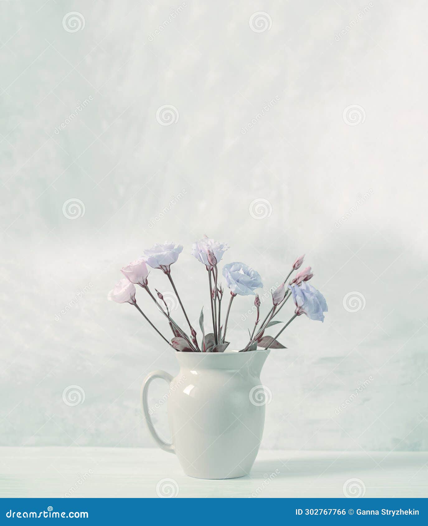Ceramic Pale Light Green Jug and Delicate White Flowers on a Light ...
