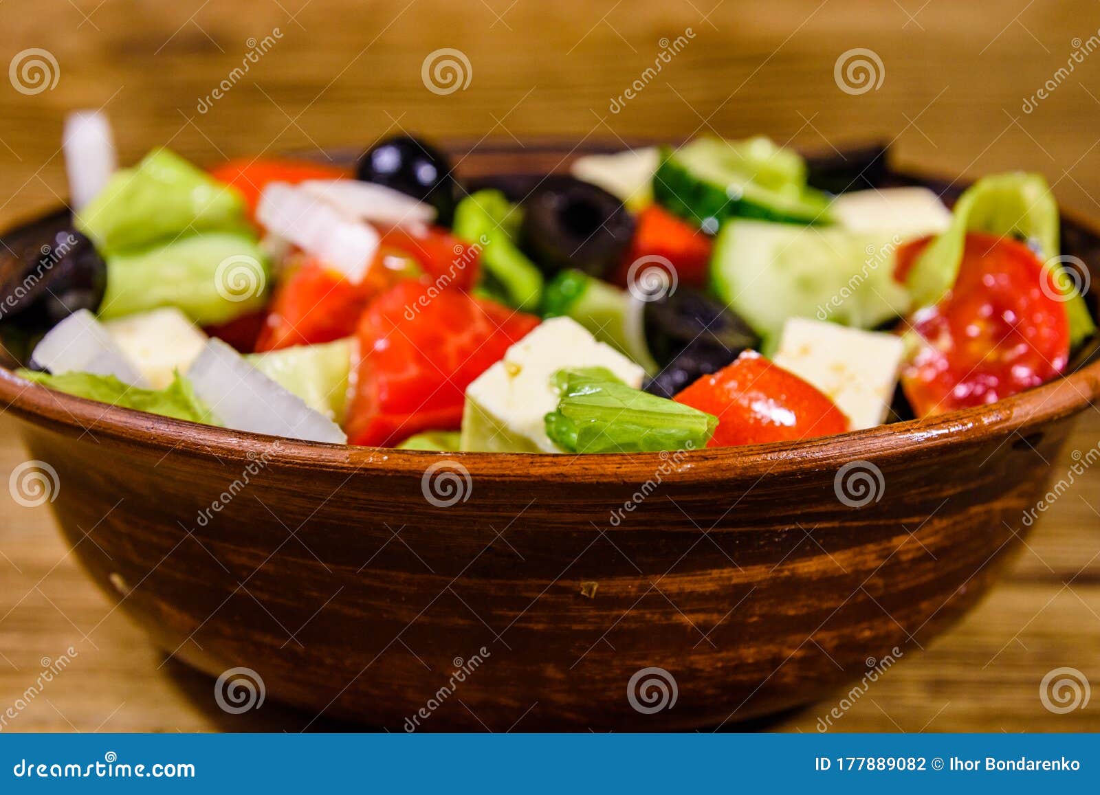 Ceramic Plate with Greek Salad on Wooden Table Stock Photo - Image of ...