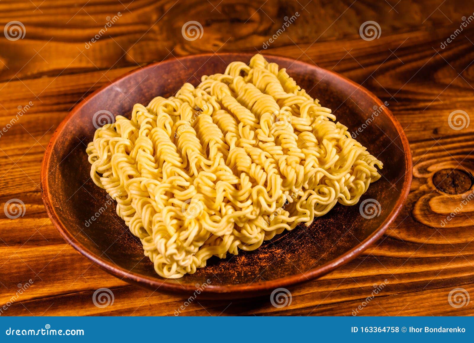 Ceramic Plate with Instant Noodles on Wooden Table Stock Photo - Image ...