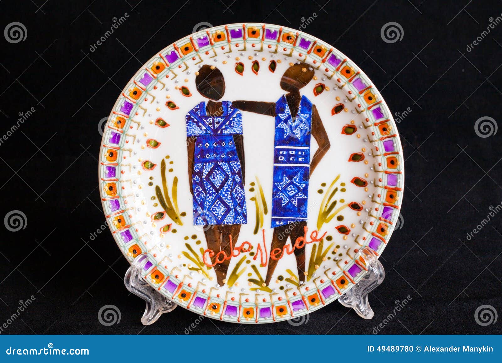 Ceramic Plate with the National Figure. Isolated on Black Stock Photo ...