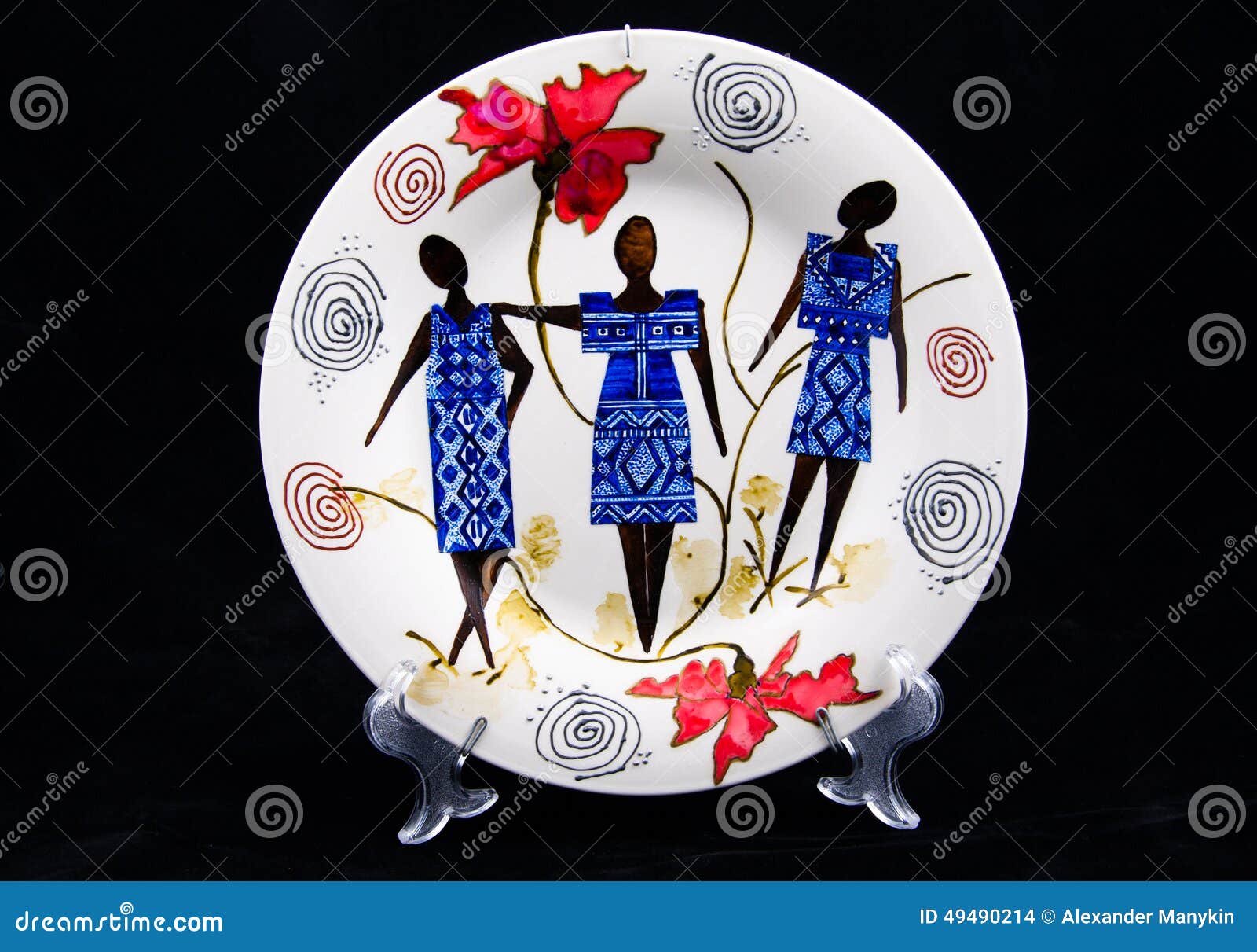 Ceramic Plate with the National Figure. Isolated on Black Stock Photo ...