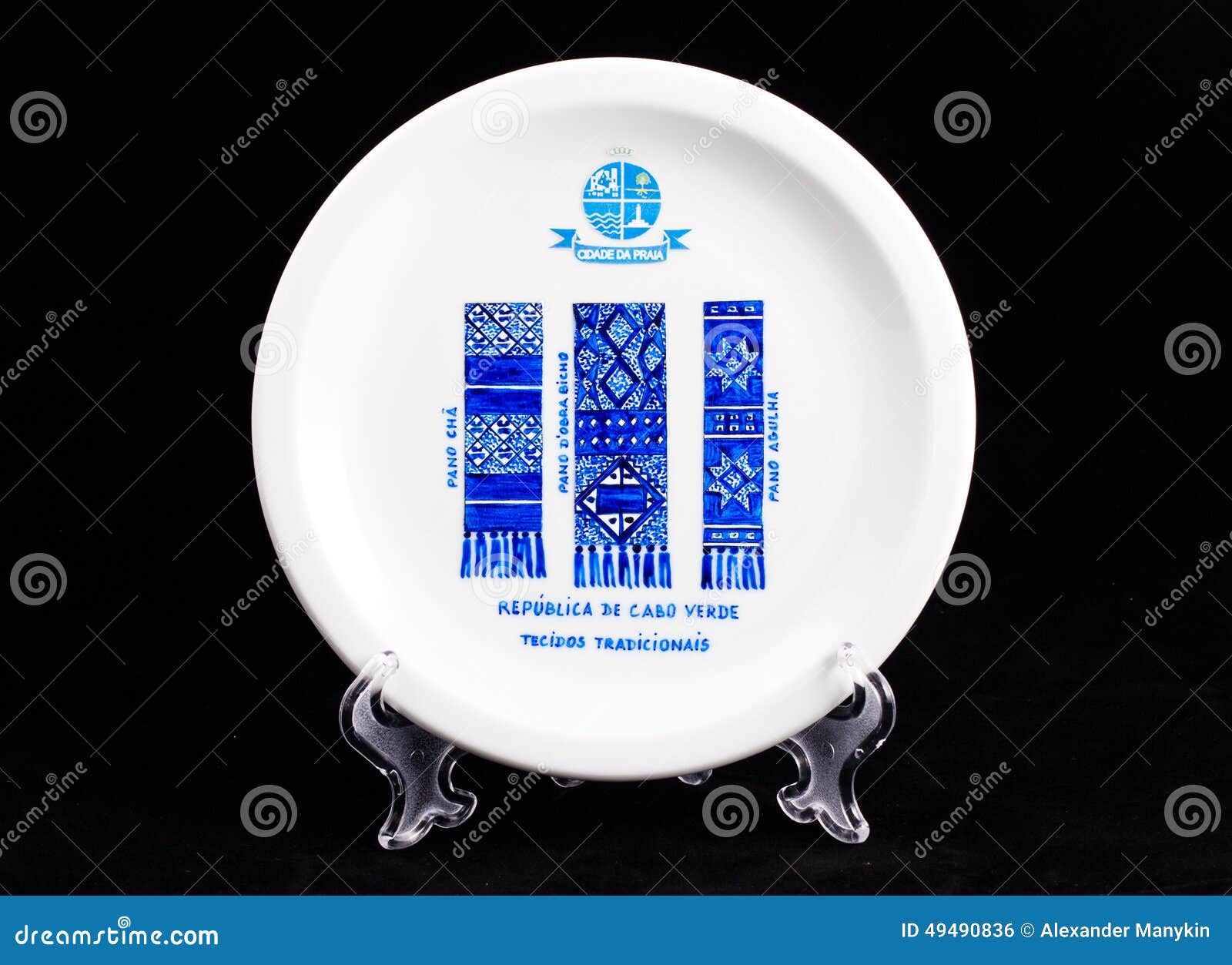 Ceramic Plate with the National Figure. Isolated on Black Stock Photo ...