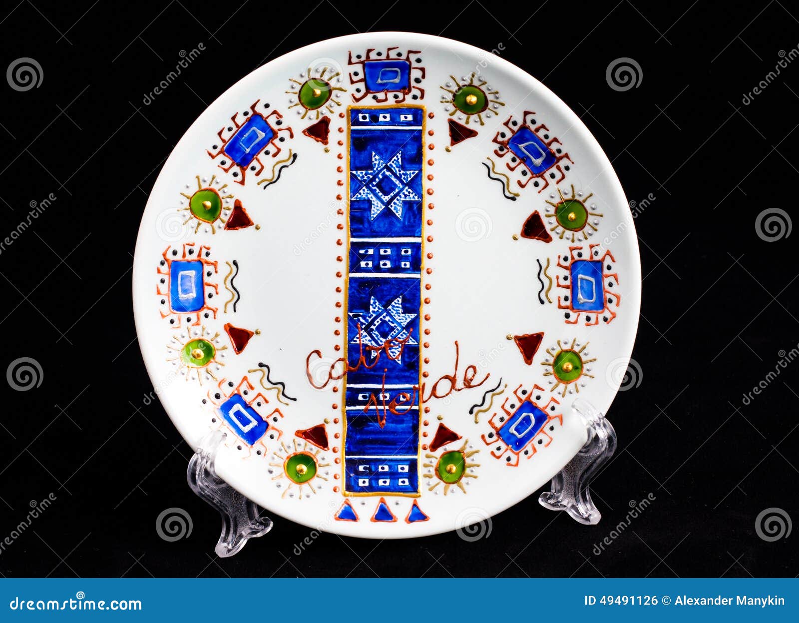 Ceramic Plate with the National Figure. Isolated on Black Stock Photo ...