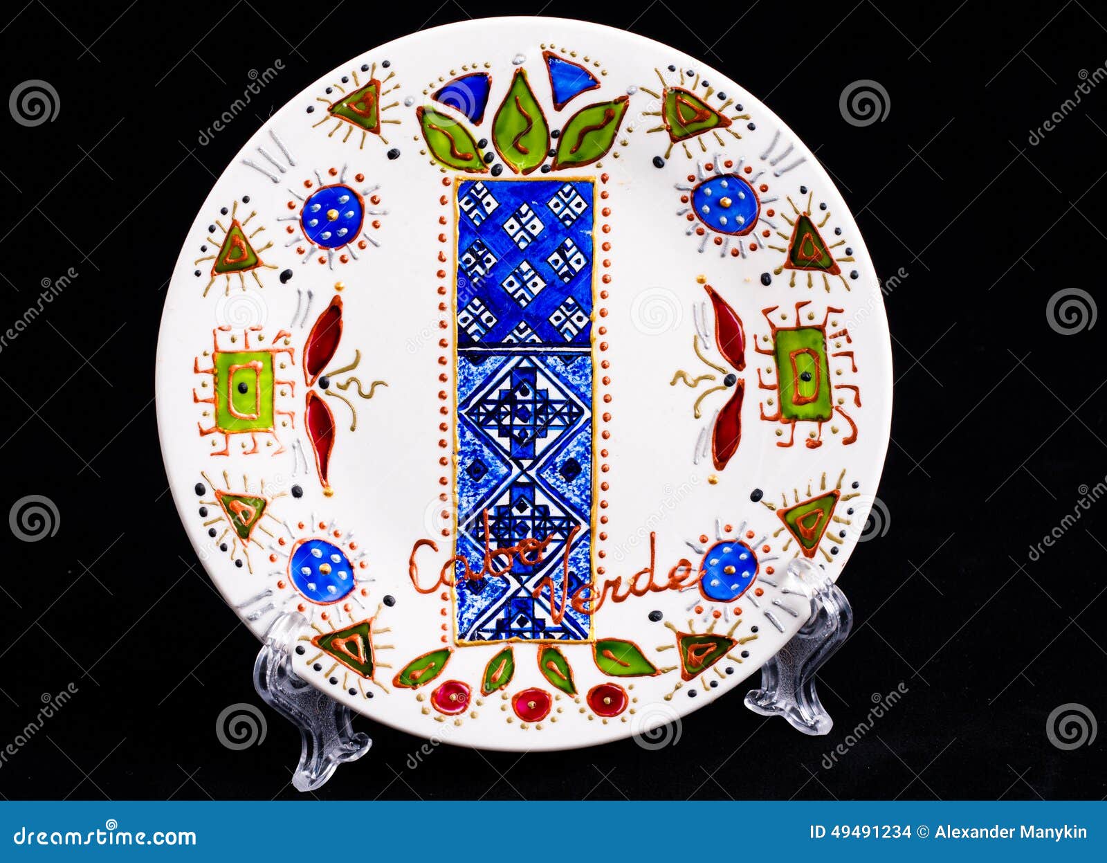 Ceramic Plate with the National Figure. Isolated on Black Stock Photo ...