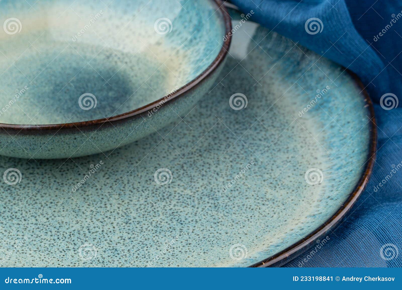 Ceramic Plate on a Wooden Table Top View. Minimalist Handmade Ceramic ...