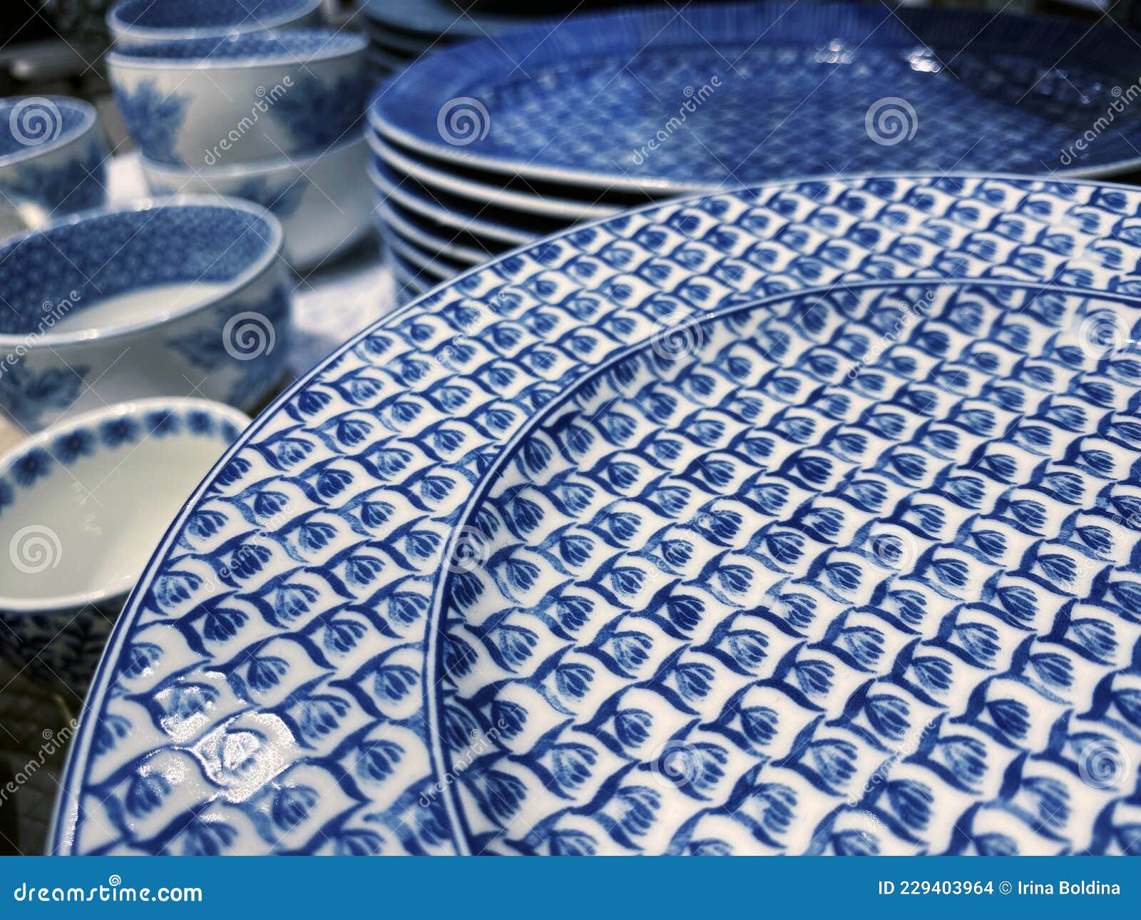 Ceramic Plates with a Blue Pattern Stock Photo - Image of kitchenware ...