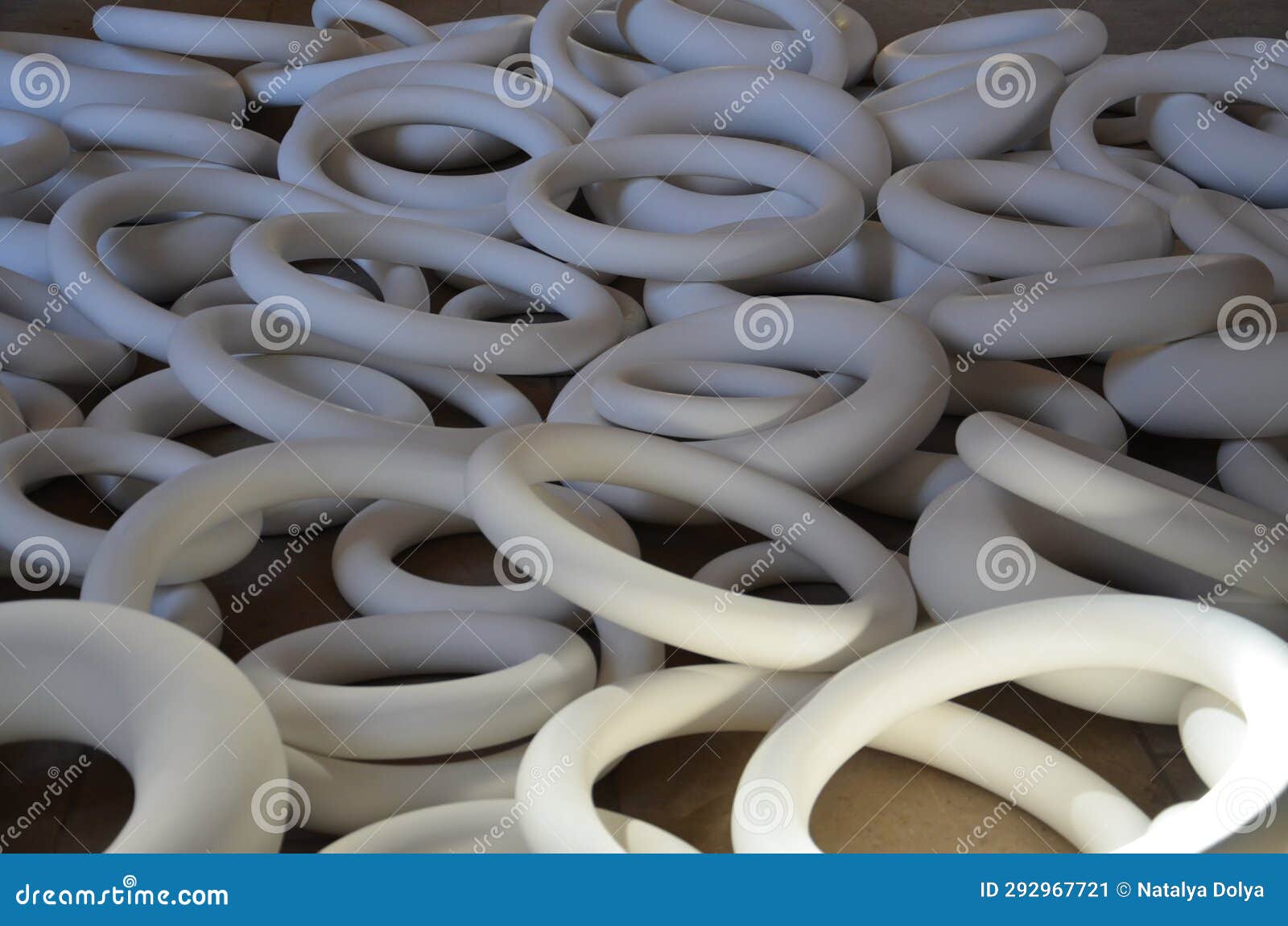 Ceramic rings on the floor stock image. Image of white - 292967721