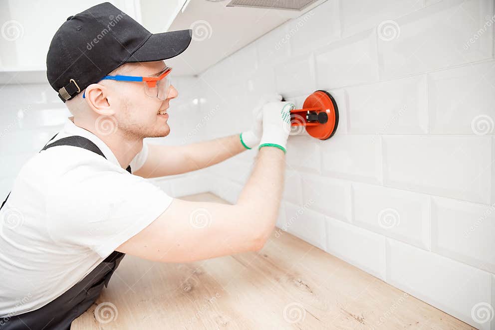 Ceramic Tile with Chamfer Hands in Process of Laying White Rectangular ...