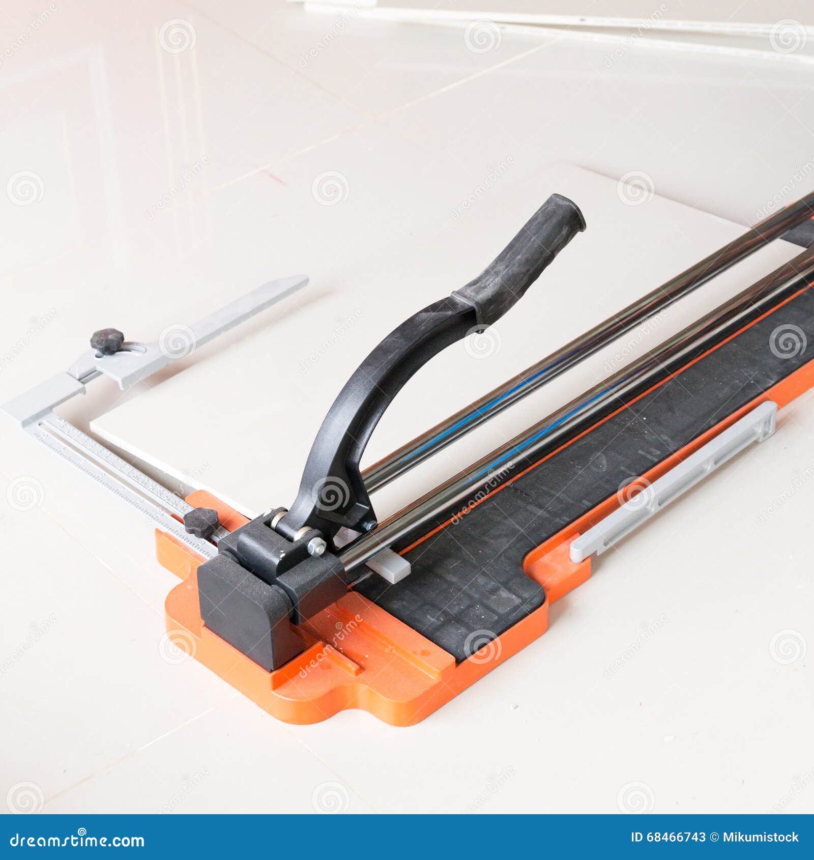 Ceramic Tile Cutting Process Using a Manual Cutter Stock Image - Image ...