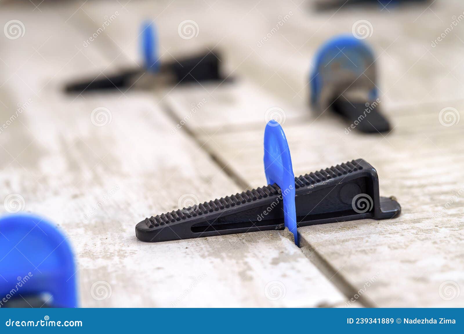 Ceramic Tile Leveling System. Apparatus for Laying Stoneware Tiles ...