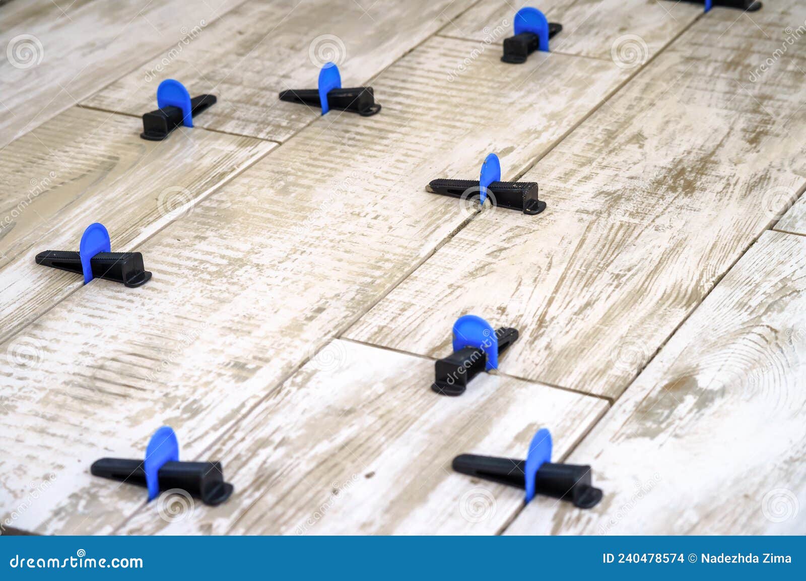 Ceramic Tile Leveling System. Apparatus for Laying Stoneware Tiles ...