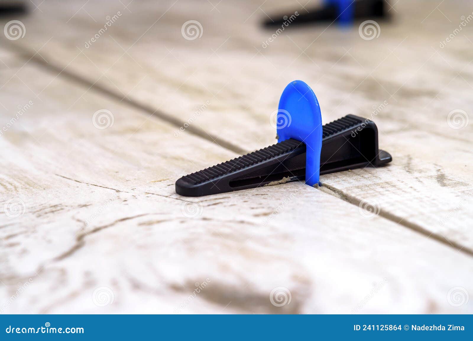 Ceramic Tile Leveling System. Apparatus for Laying Stoneware Tiles ...