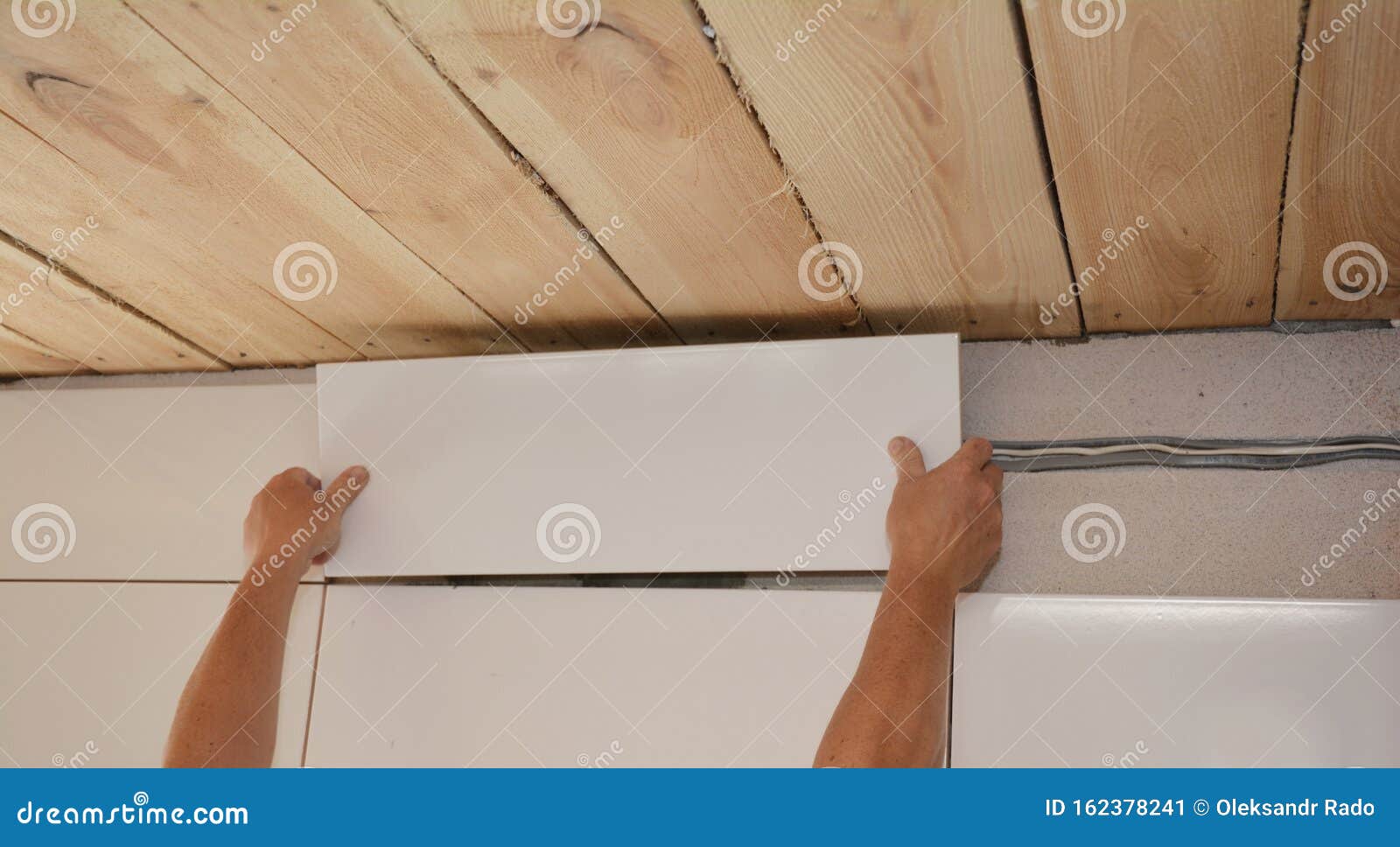 Ceramic Tiles Installation with Electric Wire Near Ceiling Indoor Stock ...