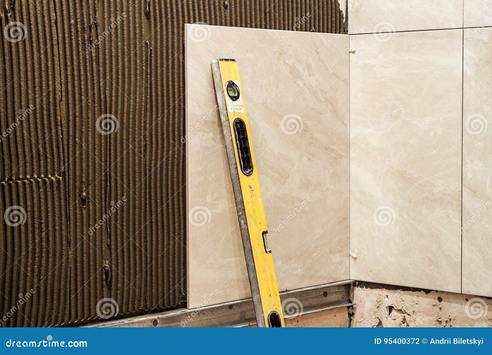 Ceramic Tiles on a Wall Installation. Home Improvement and Renovation ...