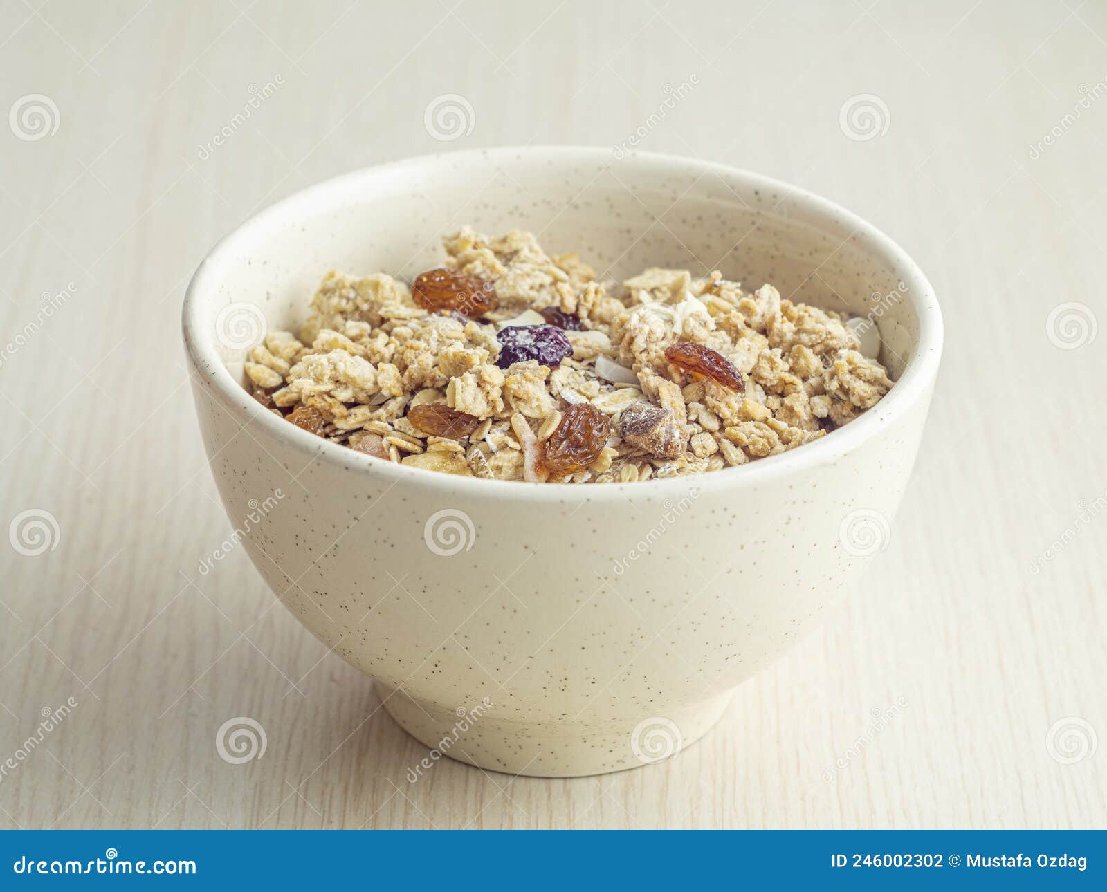 Cereal bowl on a table stock photo. Image of cereal - 246002302