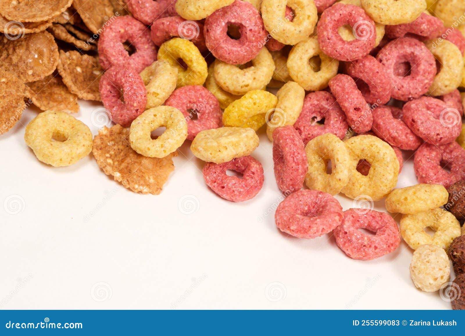 Cereals from Corn in the Form of Multi-colored Rings on a White ...