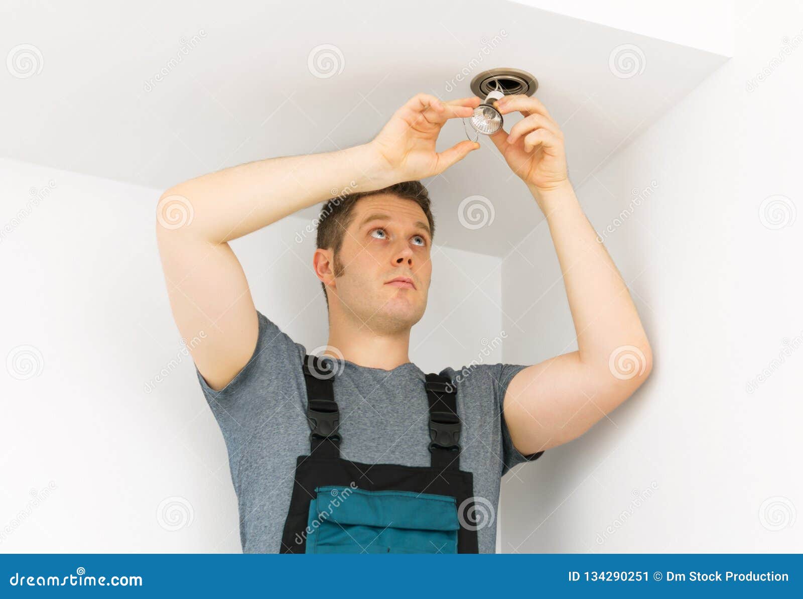 Man installing bulb stock image. Image of cable, electrical - 134290251