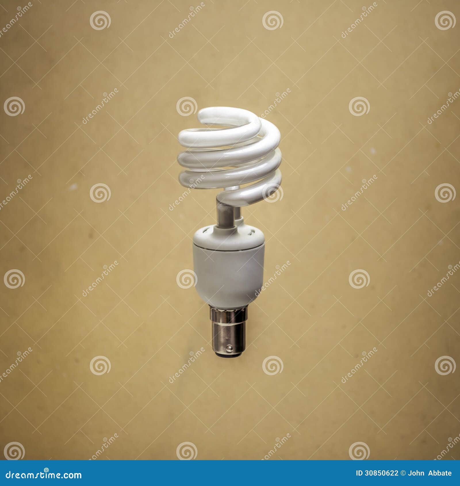 CFL on beige texture stock photo. Image of efficient - 30850622