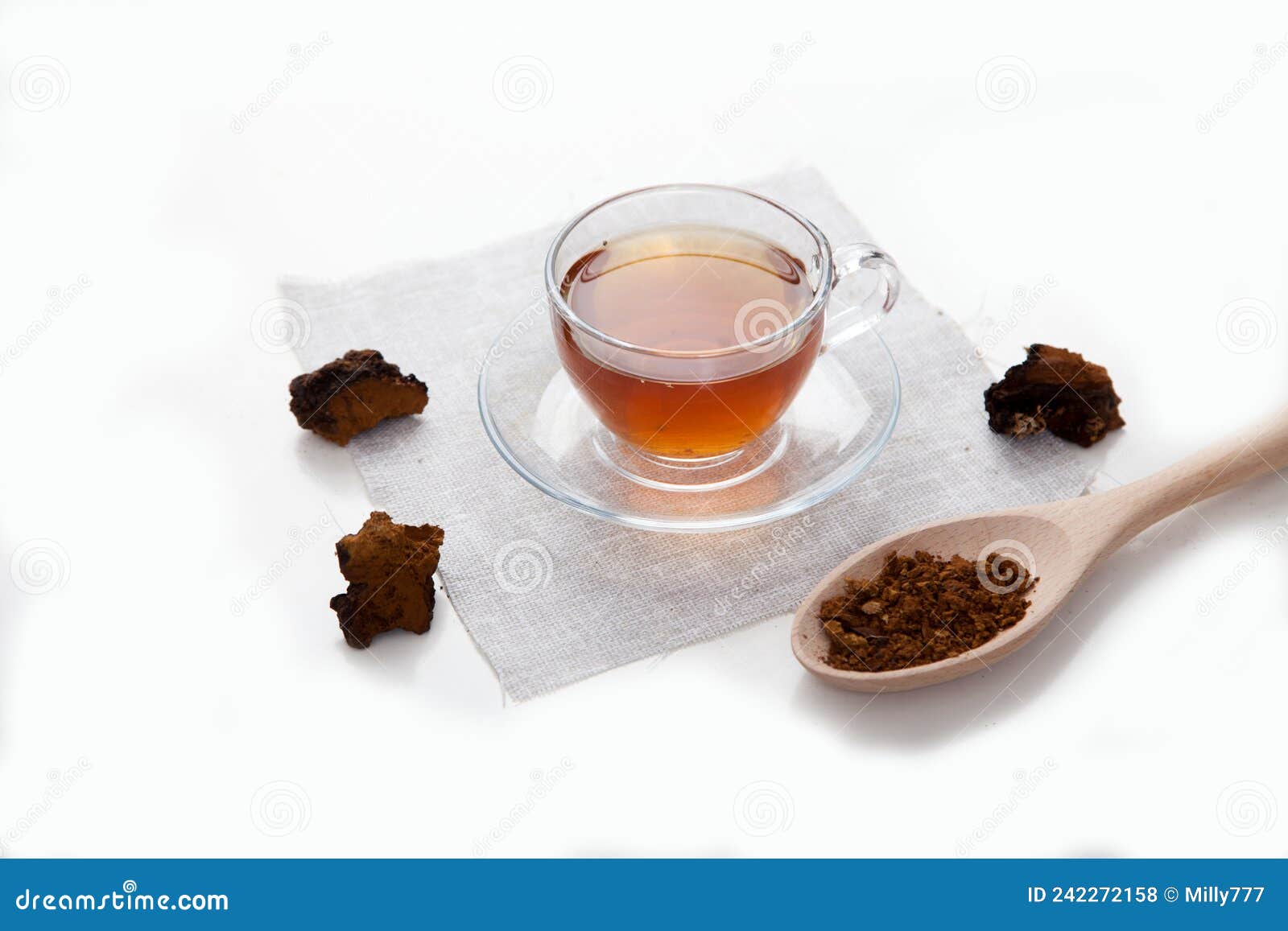 Chaga Tea in a Glass Cup and Pieces of Chaga on a Light Background ...