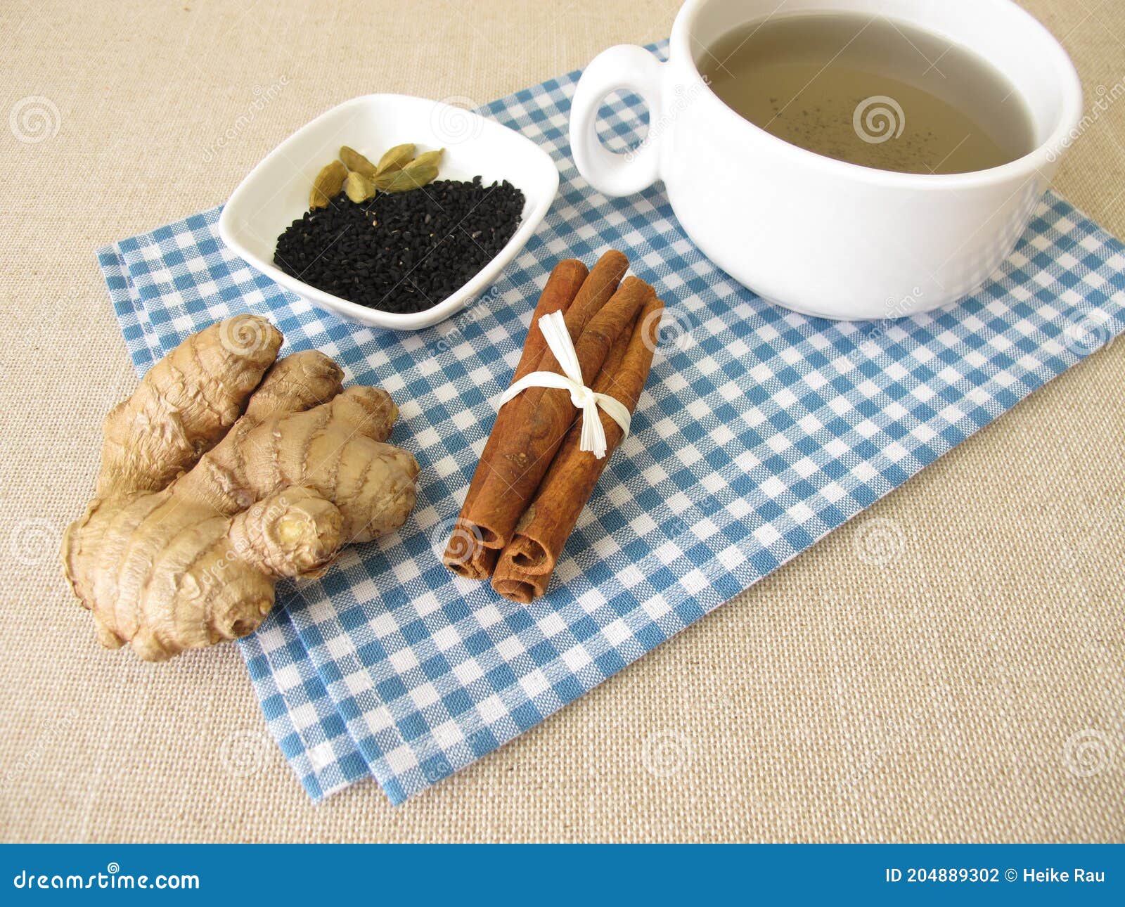 Chai with Black Cumin Seeds, Ginger, Cinnamon and Cardamom Stock Photo ...