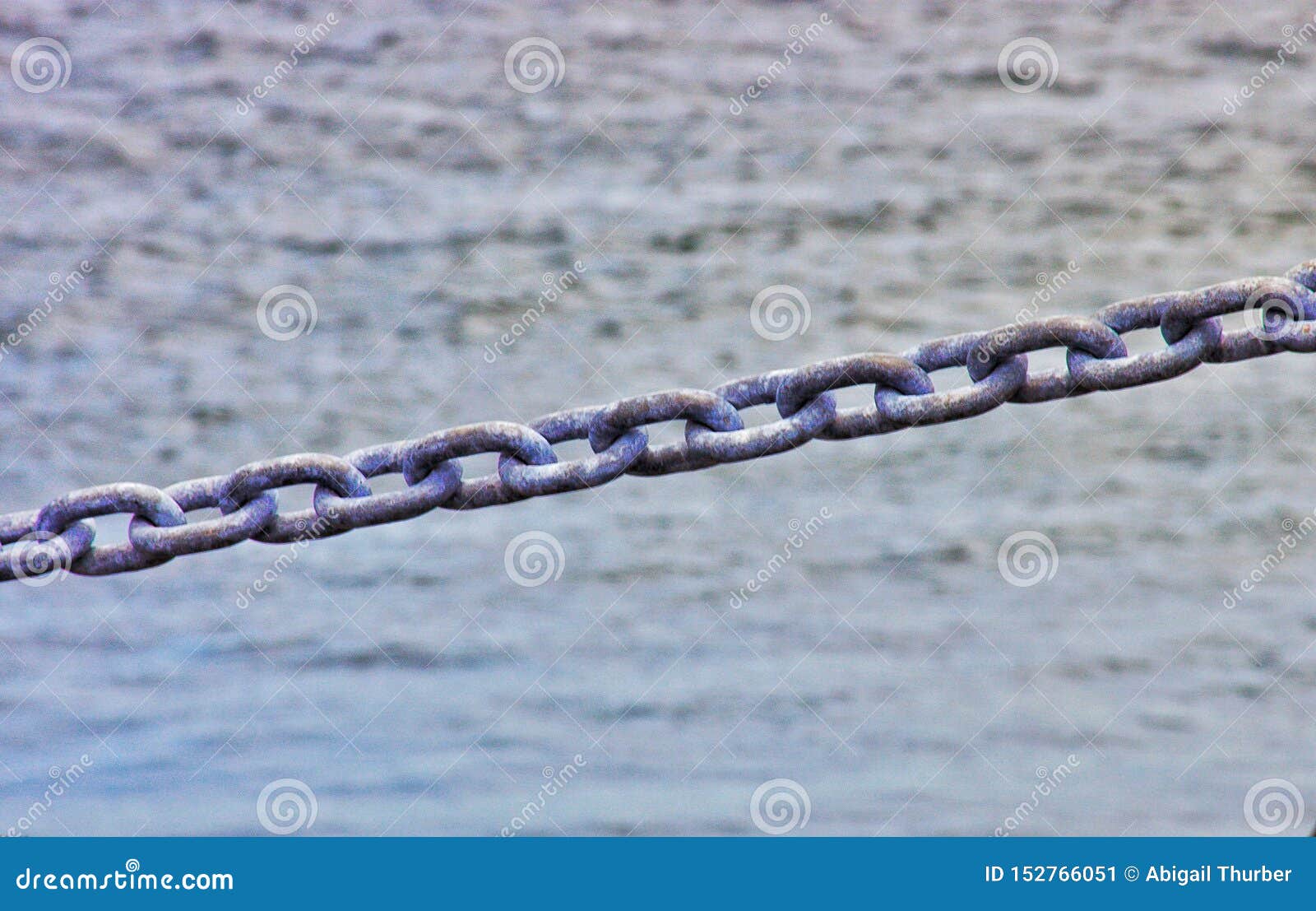 Chain by the bay stock image. Image of blue, metal, chain - 152766051