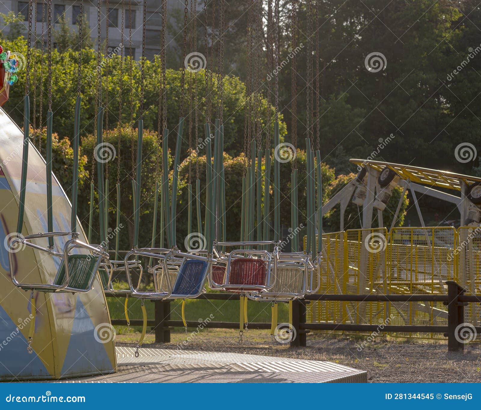 Chain Carousel among Green Trees . Stock Image - Image of plant ...