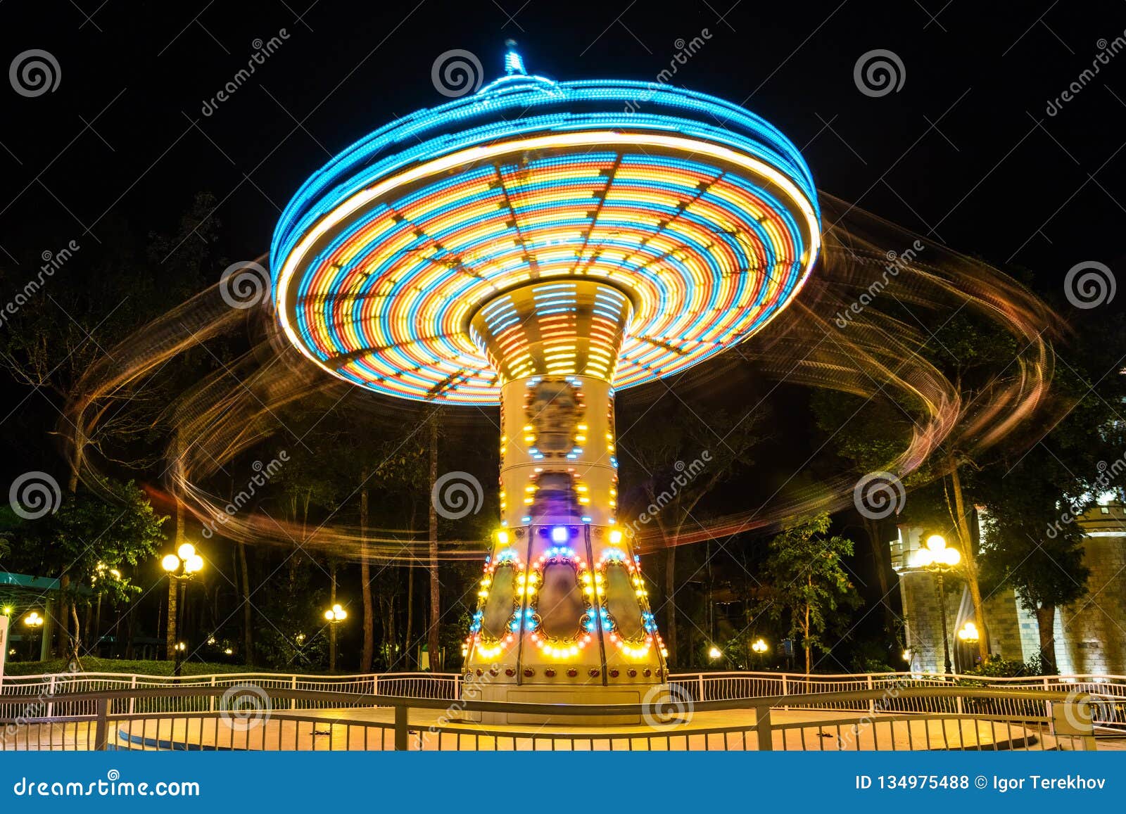 Chain Carousel Ride in Amusement Park at Night Stock Photo - Image of ...