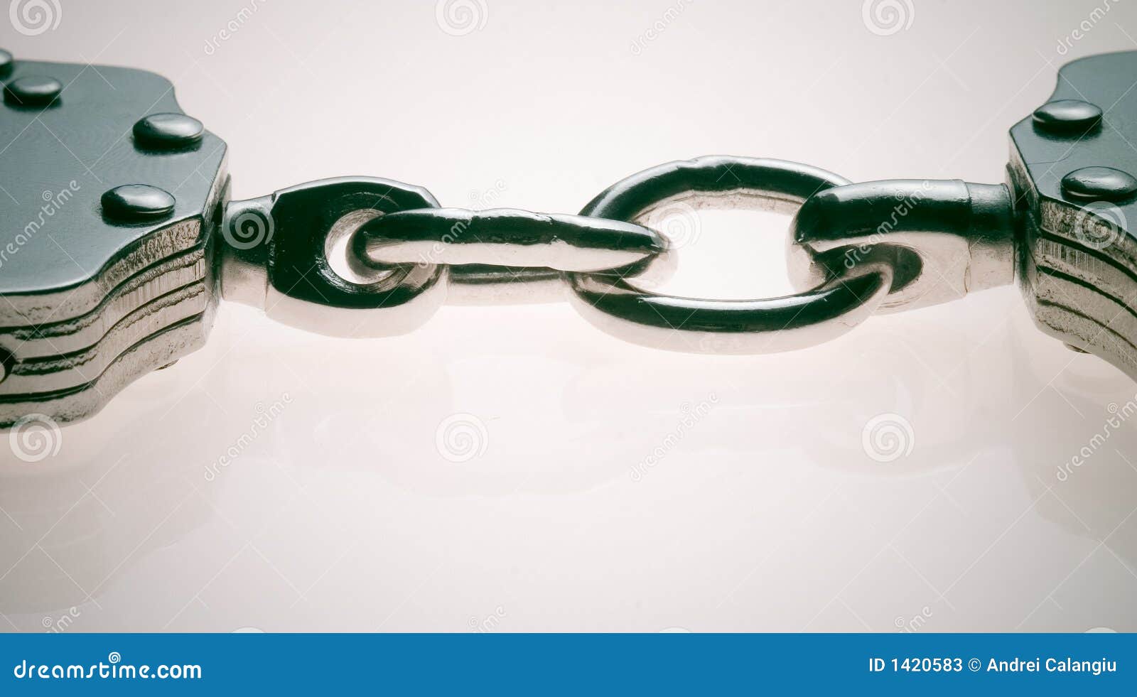 Chain Connecting Two Handcuffs Stock Image - Image of handcuffs ...