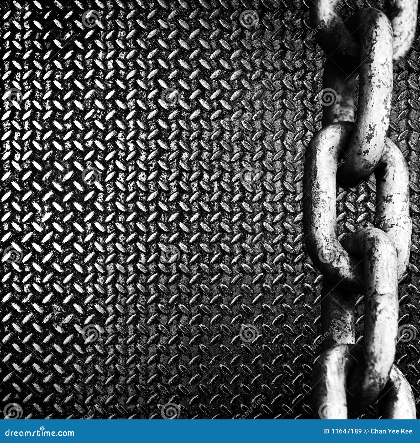 Chain on diamond plate stock image. Image of grid, floor - 11647189