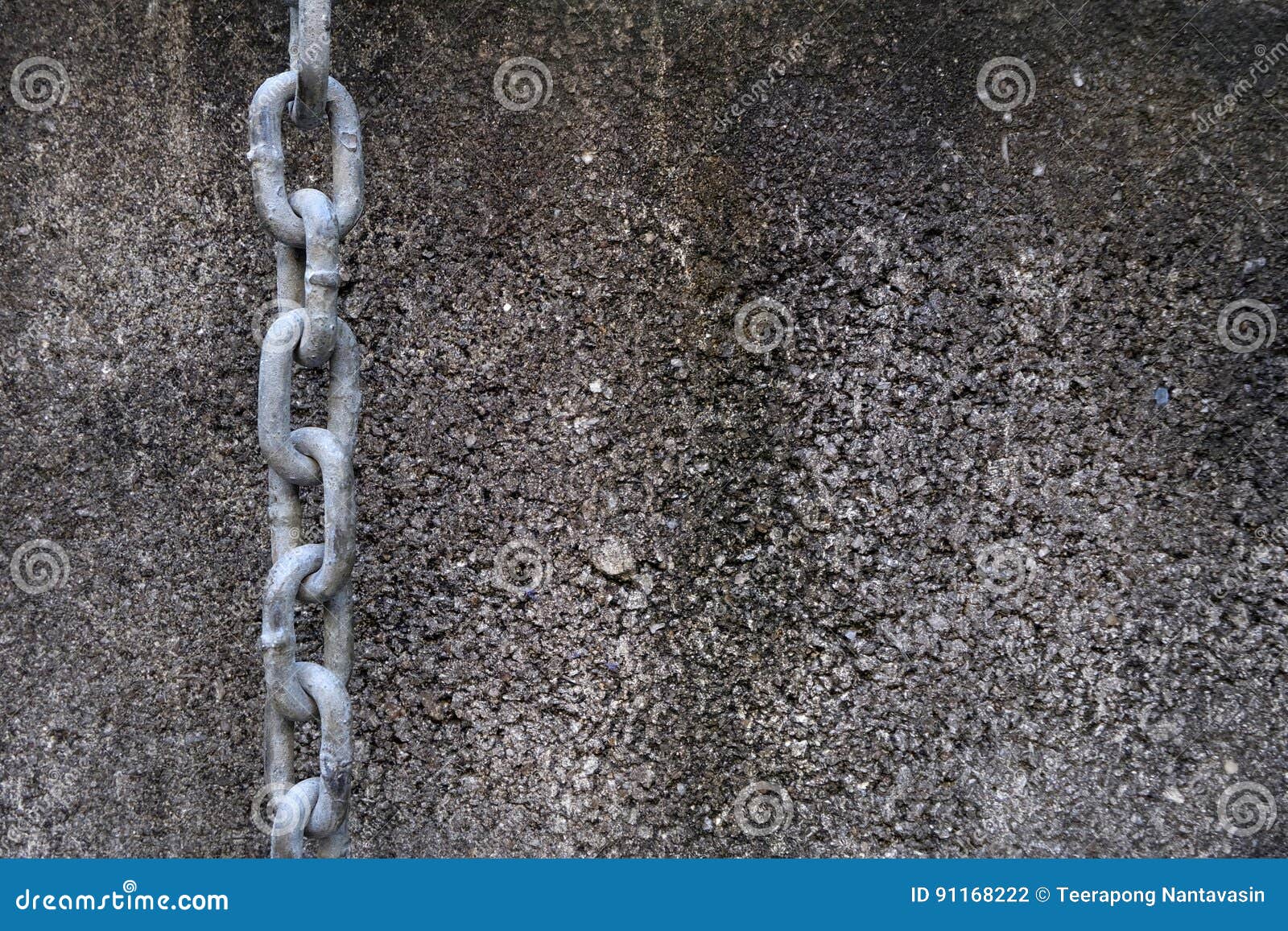 Chain Hanging on a Concrete Wall Stock Photo - Image of metallic ...