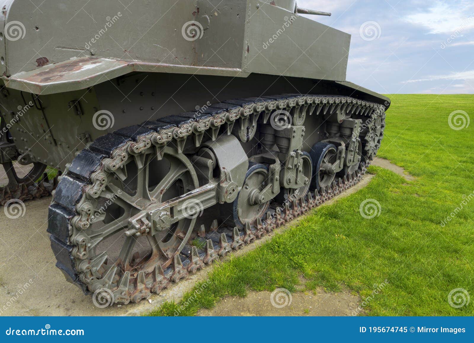 Chain Link Wheels of a Army Tank on Grass Field Stock Image - Image of ...