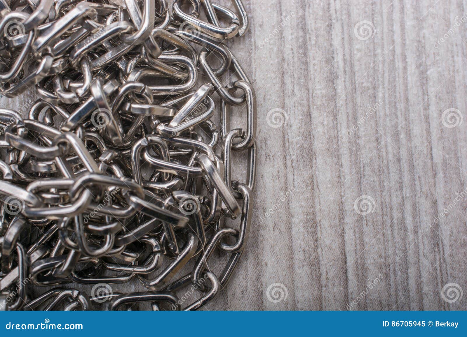 Chain Made of Silver Color Metal on a Grey Background Stock Image ...