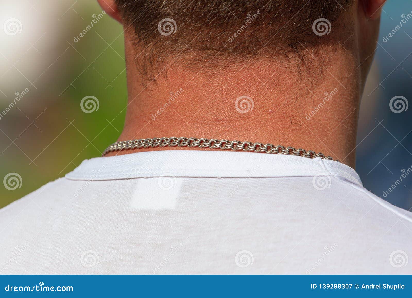 Chain on the neck of a man stock image. Image of silver - 139288307