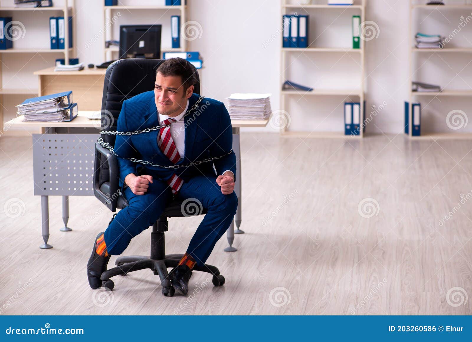 Chained Male Employee Working in the Office Stock Photo - Image of ...