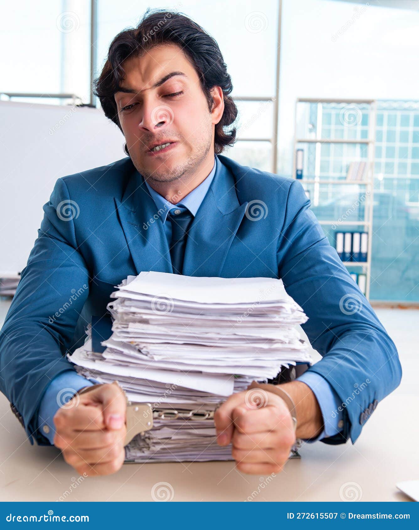 Chained Male Employee Unhappy with Excessive Work Stock Image - Image ...