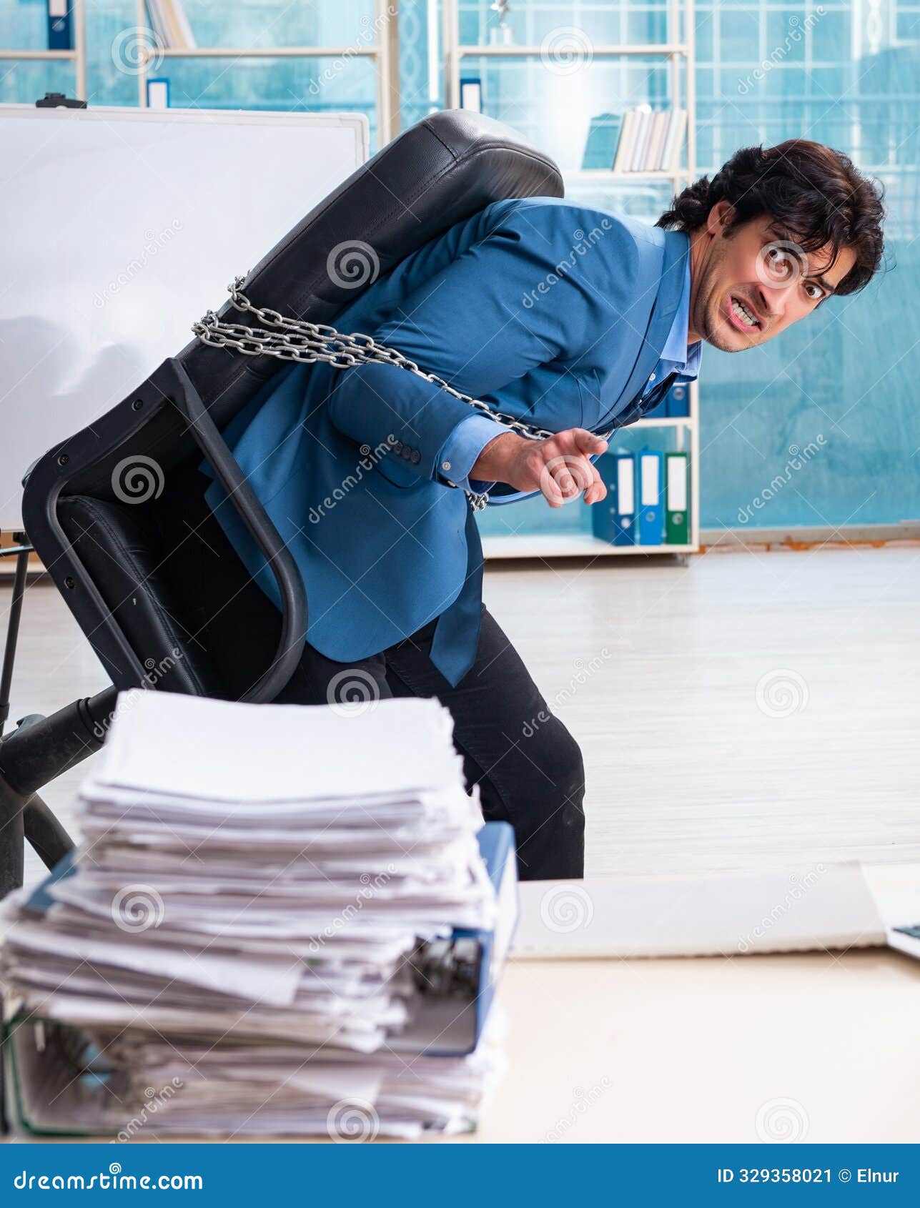 Chained Male Employee Unhappy with Excessive Work Stock Image - Image ...