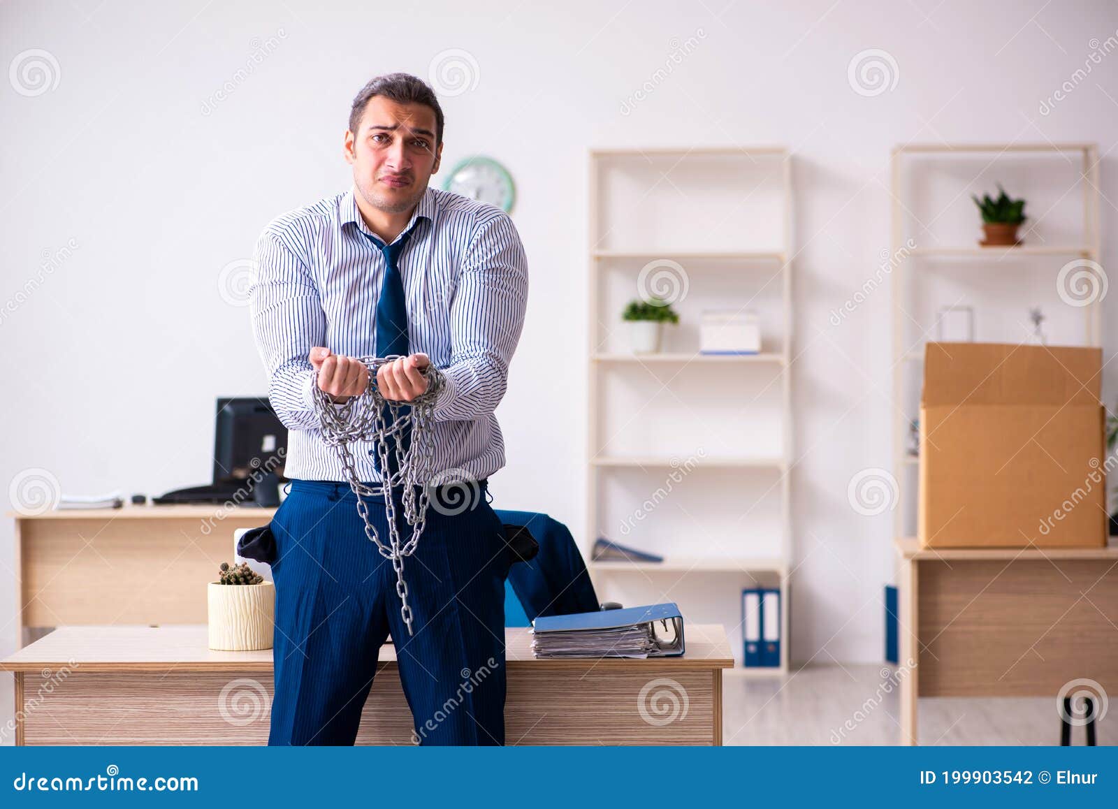 Chained Male Employee Working in the Office Stock Photo - Image of long ...